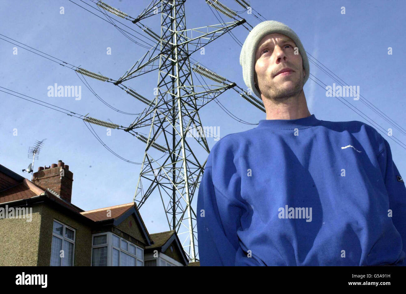 Pylon near houses hi-res stock photography and images - Alamy