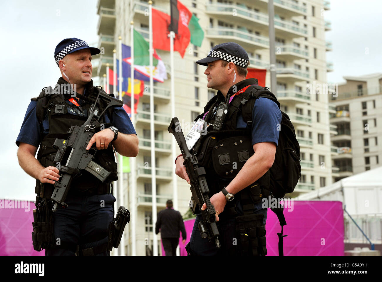 Police patrol the athletes village at the olympic park hi-res stock ...