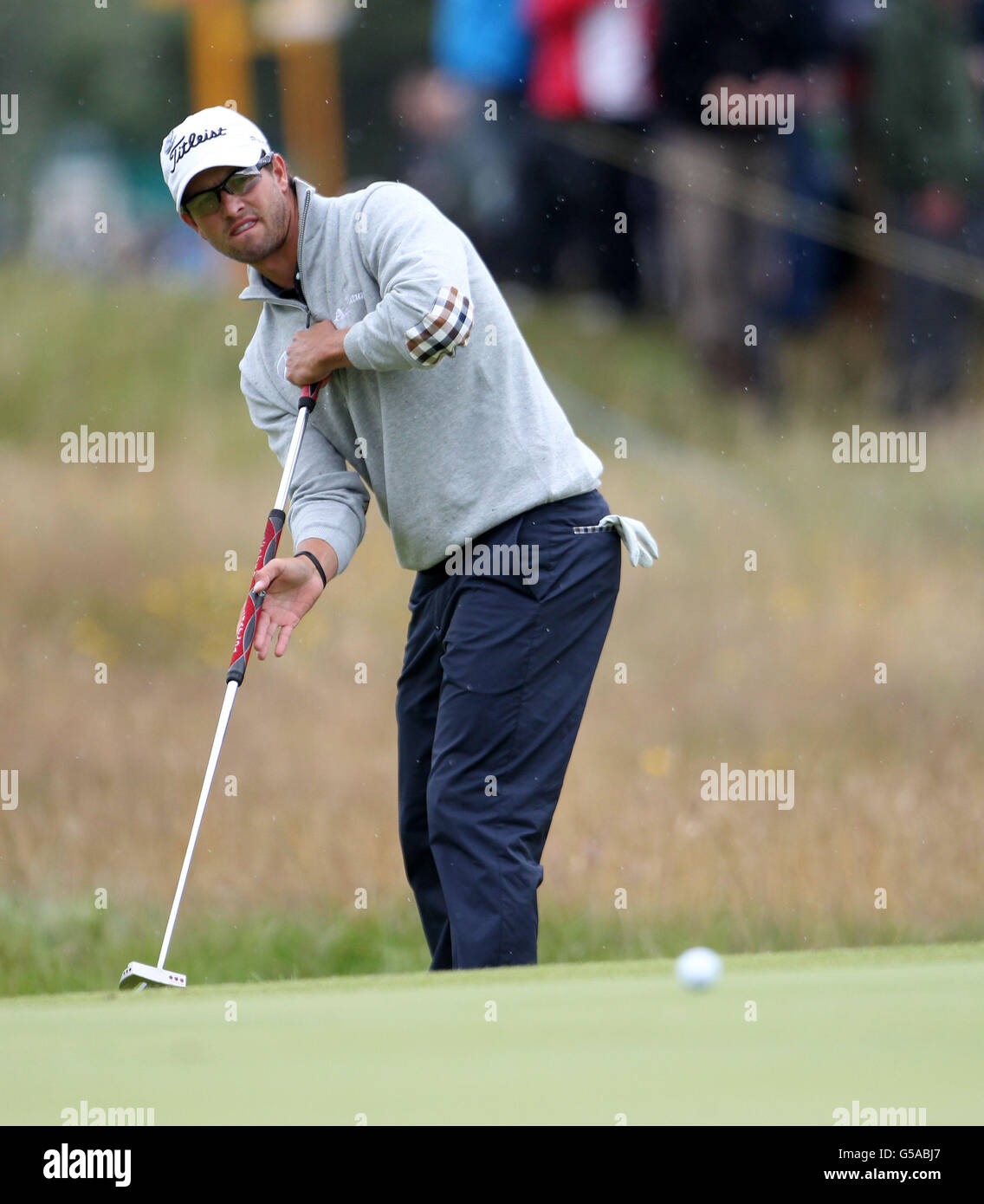 Australia's Adam Scott putts on the 4th during day two of the 2012 Open ...