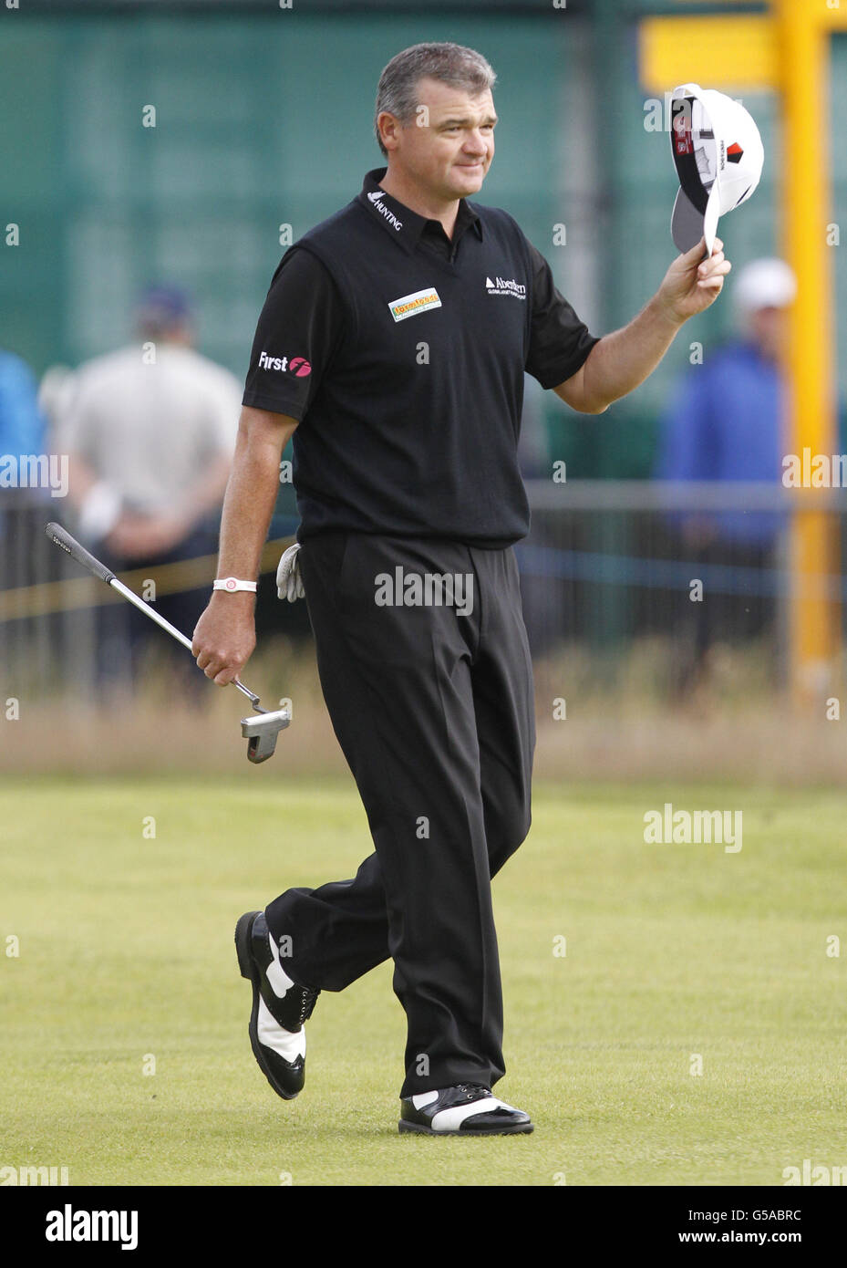 Scotland's Paul Lawrie acknowledges the crowd on the 18th during day ...