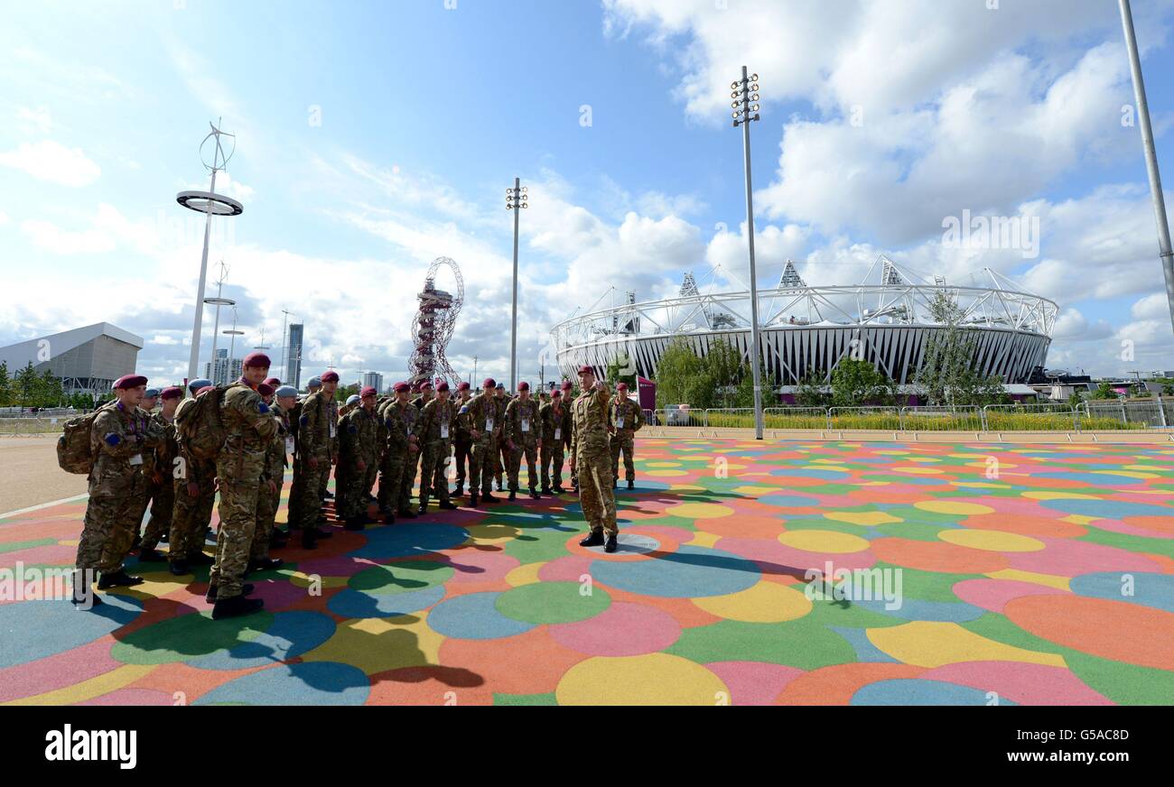 British Army personnel are briefed in the Olympic Park in Stratford ...