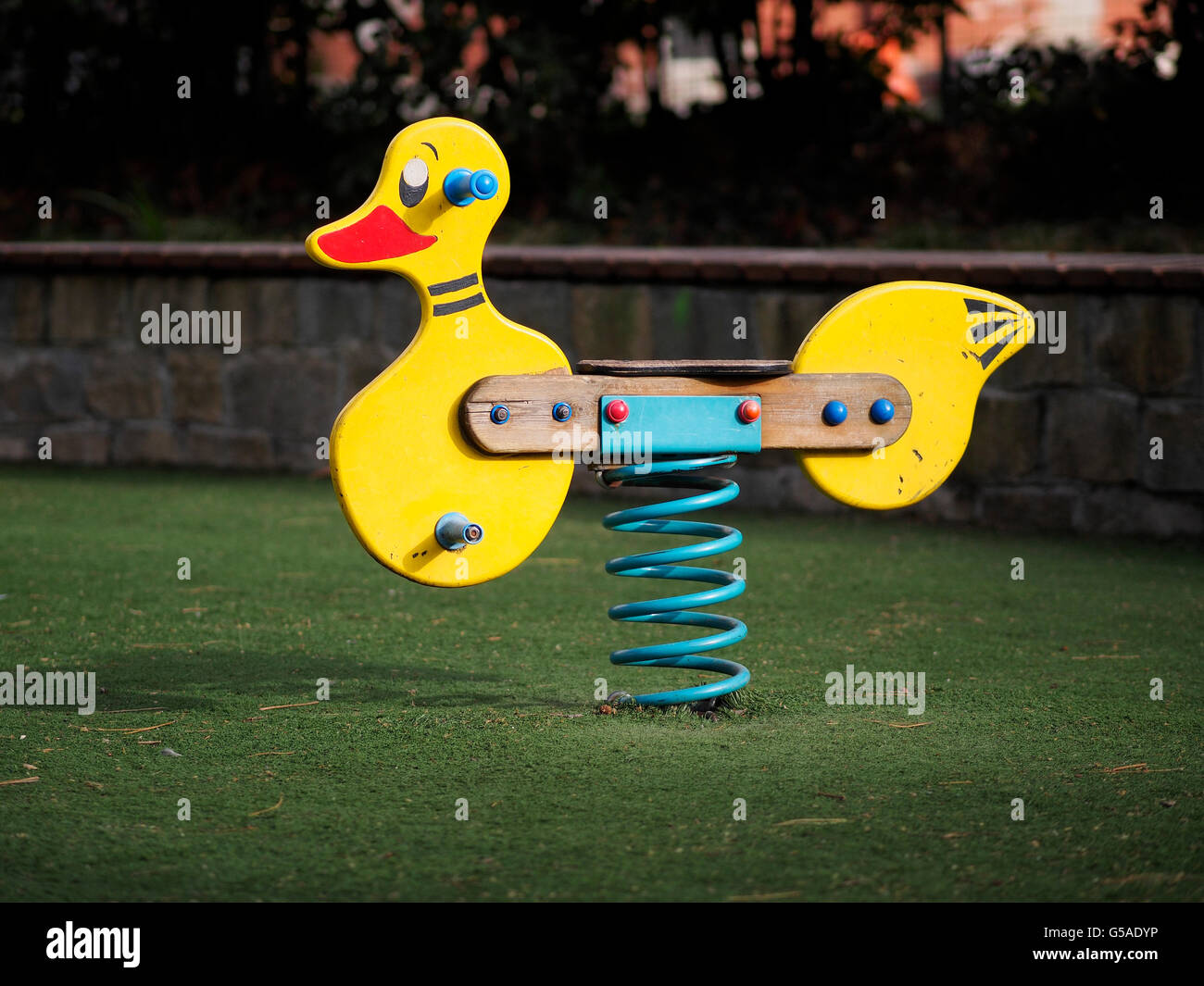 A rocking duck in the playground of a public park Stock Photo - Alamy