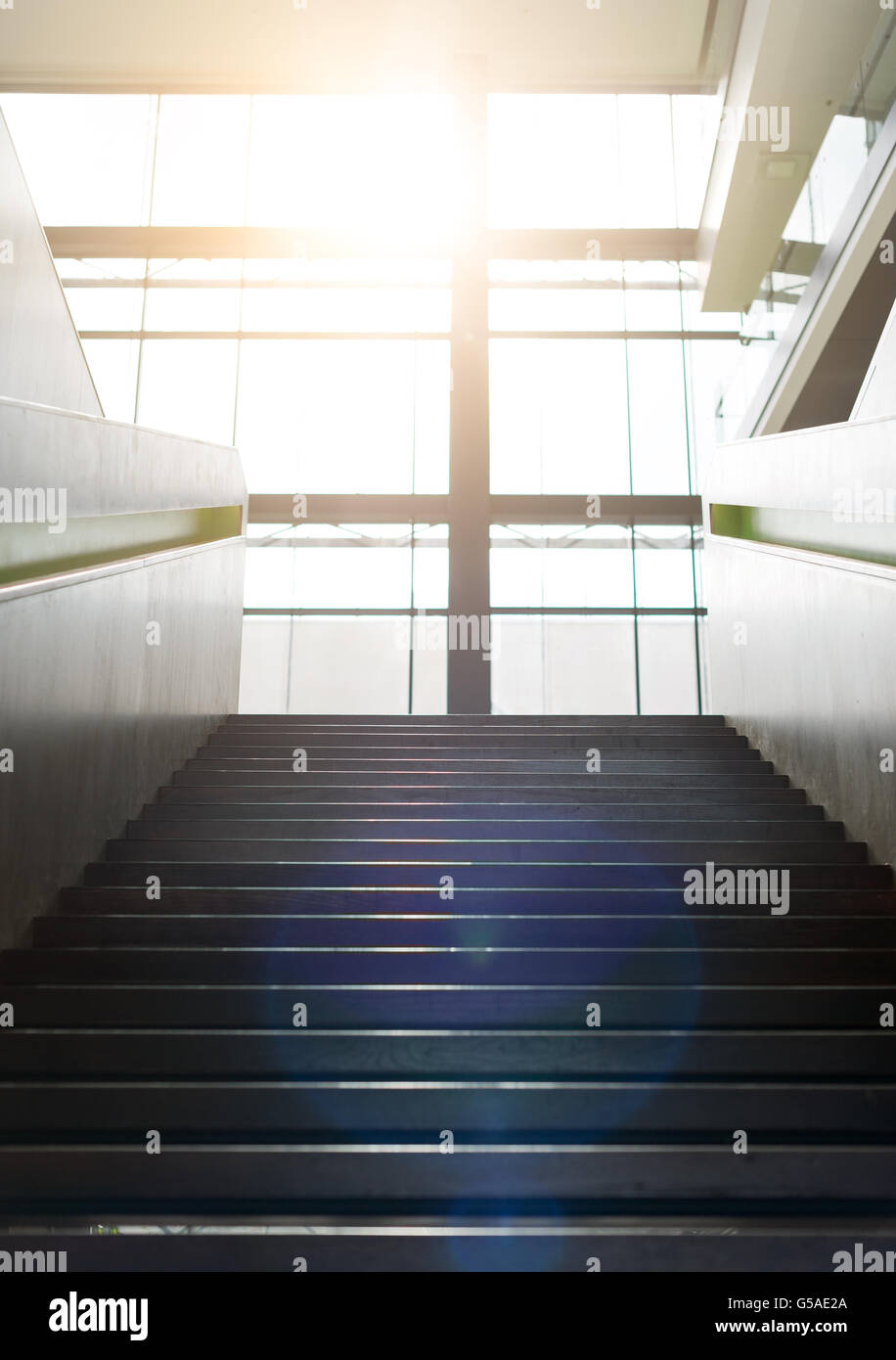Stairs up inside the building and sun glare Stock Photo - Alamy