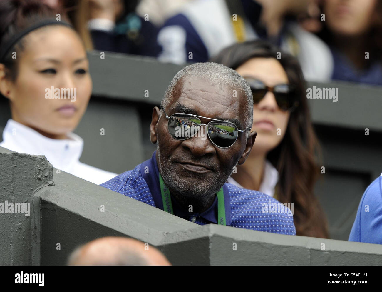 Richard Williams watches his daughter, USA's Serena Williams on Centre ...