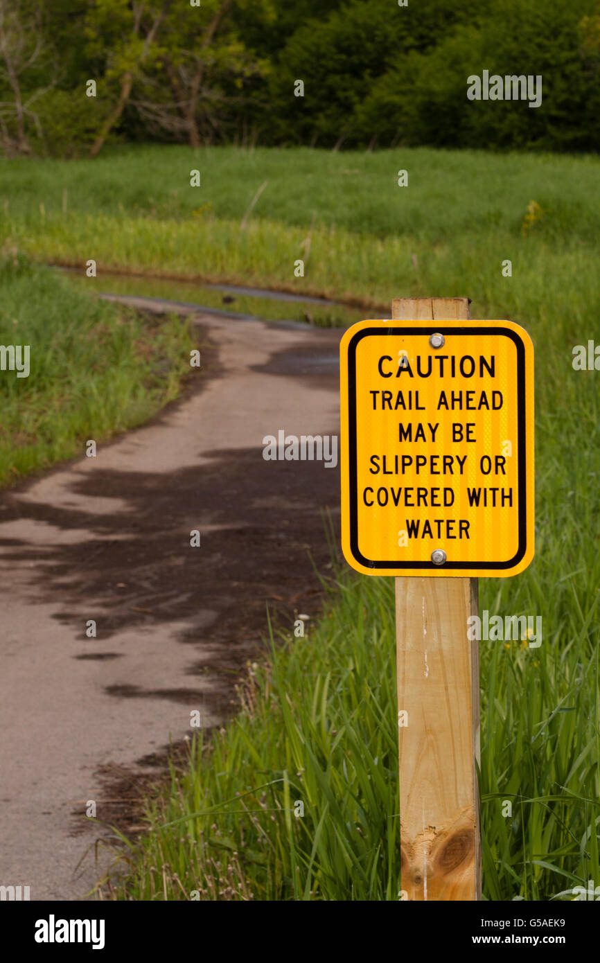 Obvious Caution Sign at Trail Head Stock Photo - Alamy