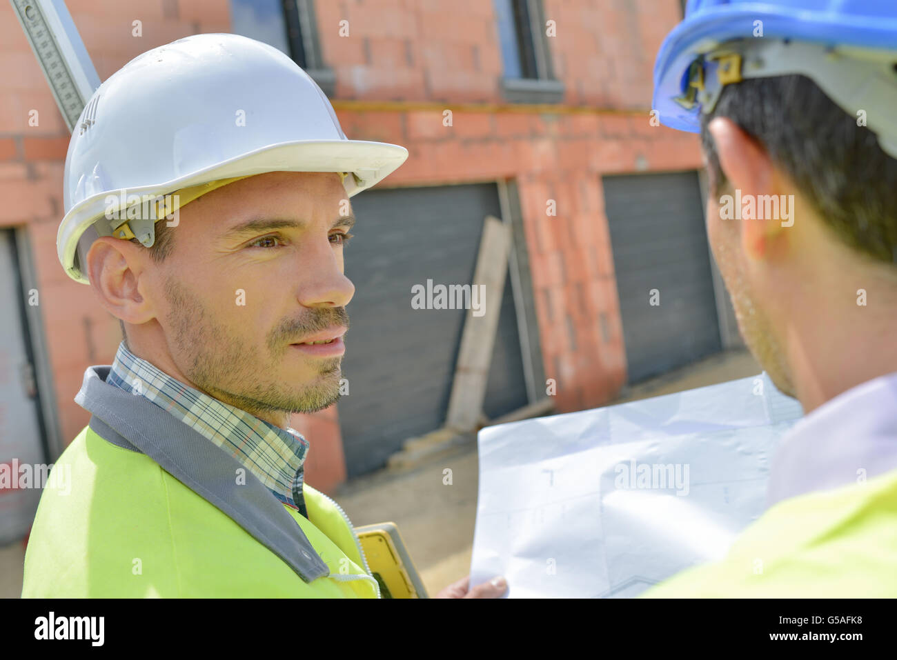 Architect checking plans hi-res stock photography and images - Alamy