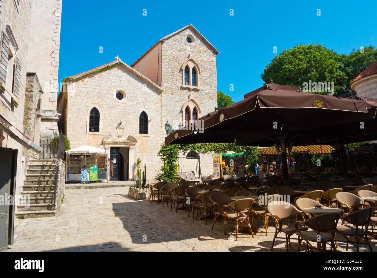 Restaurant terrace, in front of St John's church, Stari grad, old town ...