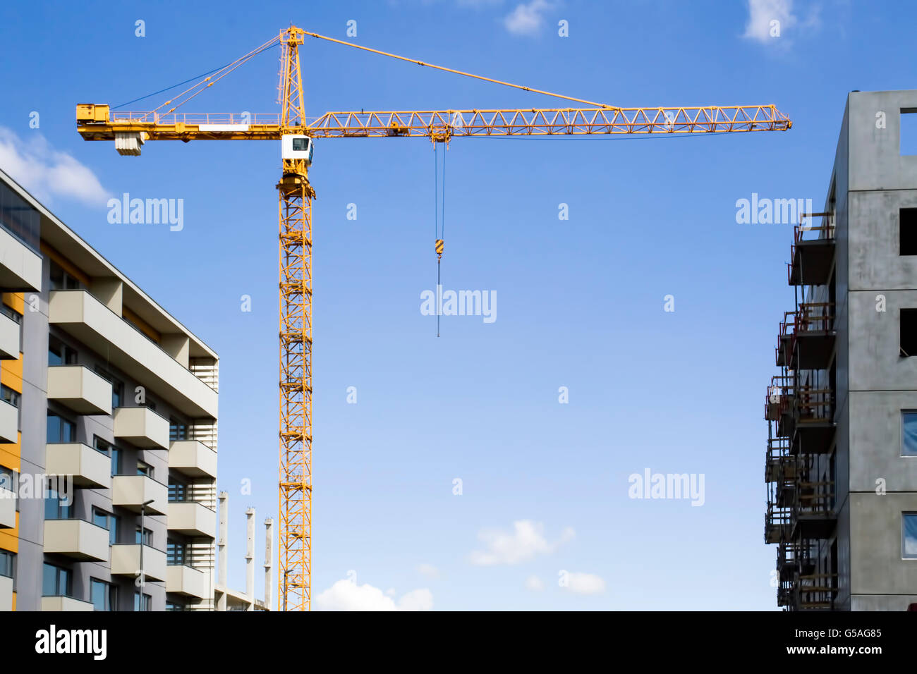Crane and building construction site. Construction concept Stock Photo ...