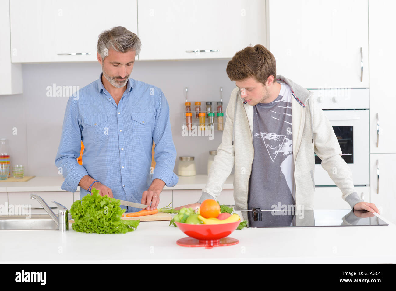 Teen kitchen male hi-res stock photography and images - Alamy