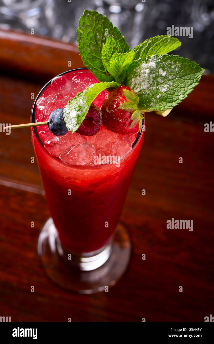 Modern berry cocktail in long zombie glass Stock Photo - Alamy