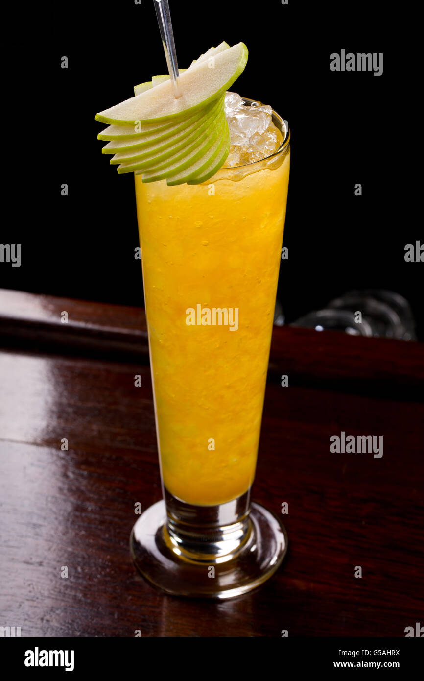 Collins Cocktail on wooden bar served in long glass Stock Photo - Alamy