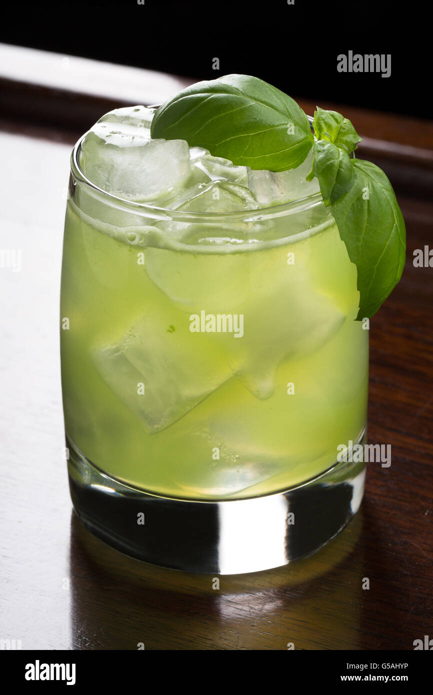 Gin Basil Smash cocktail with fresh basil Stock Photo - Alamy