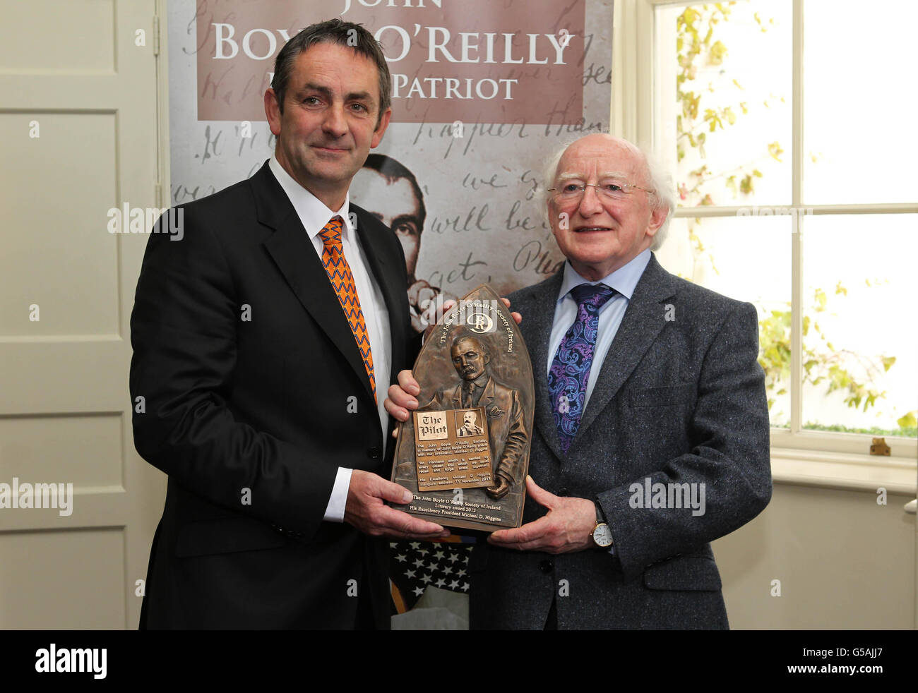 Chairman Richie Culhane presents President Michael D Higgins with the ...