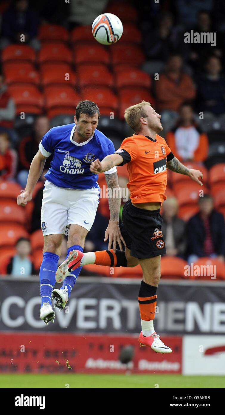 Everton's Shane Duffy heads from Dundee United's Johnny Russell during ...