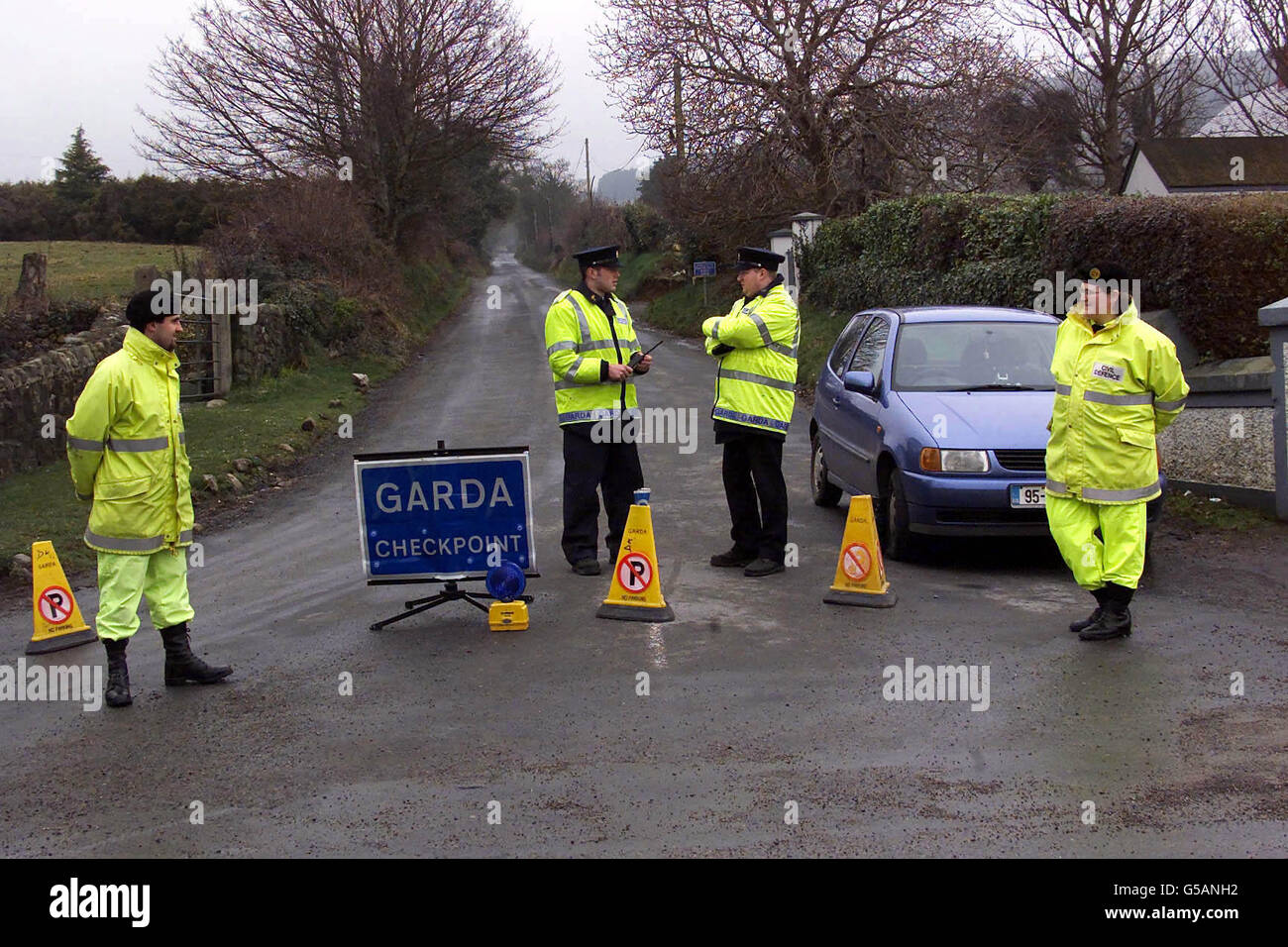 Gardi and a Civil Defence man at a checkpoint in the Ravensdale area ...