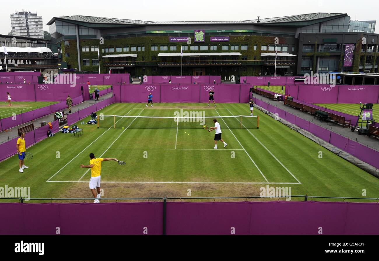 Players practice on the outside courts at the Olympic tennis venue ...