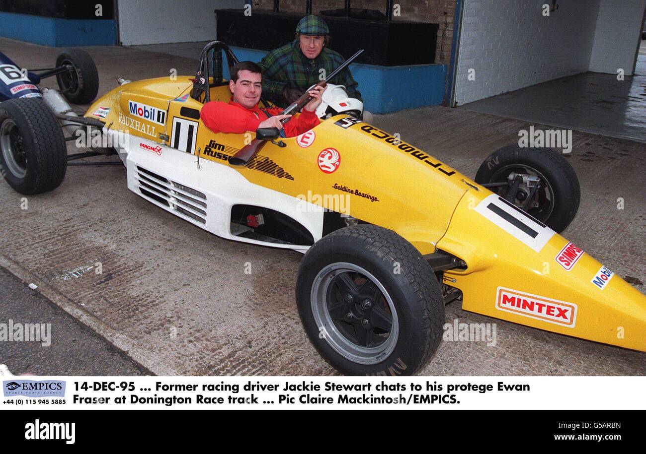14-DEC-95. Former racing driver Jackie Stewart chats to his protege ...