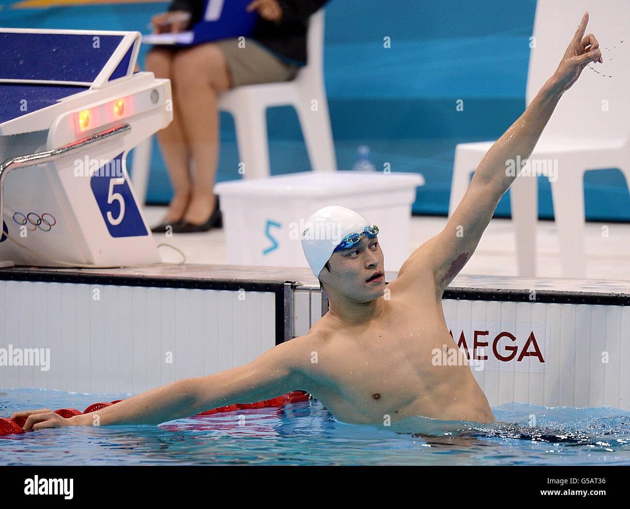London Olympic Games - Day 2. China's Yang Sun celebrates winning his ...