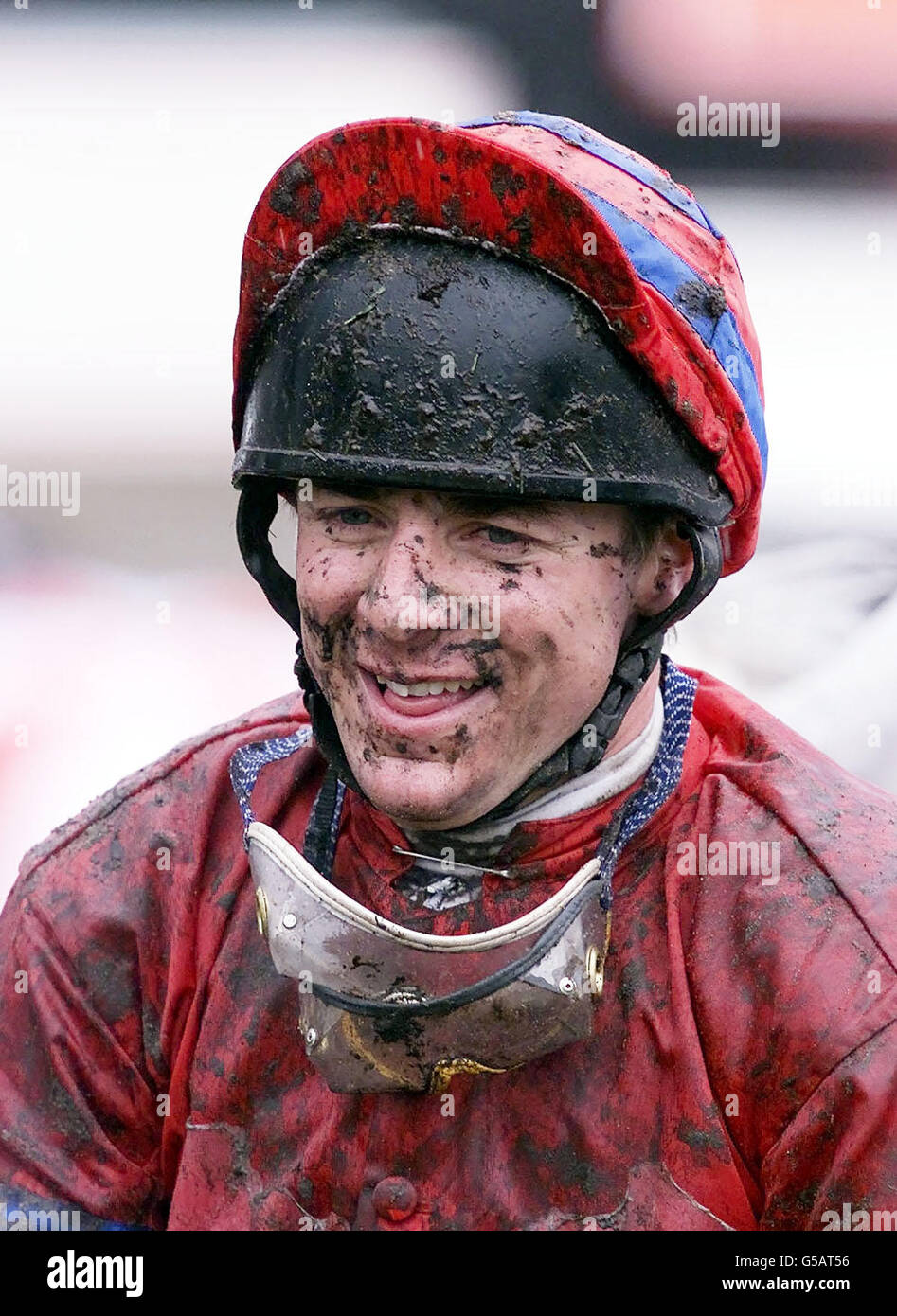 Jockey Richard Guest pats his mount Red Marauder after winning the 2001 ...