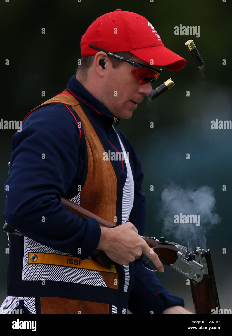Great Britain's Richard Brickell releases the cartridges from his ...