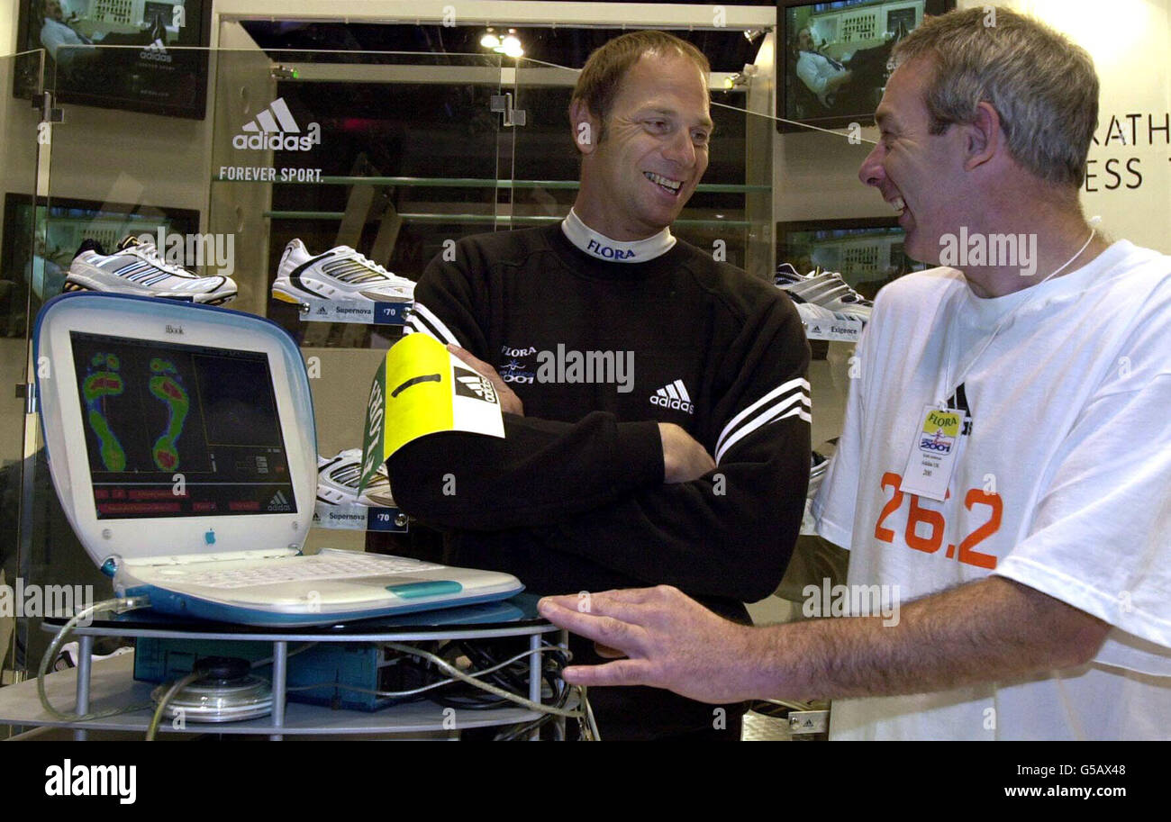 Sir Steve Redgrave talks to marathon runner Keith Anderson who is using ...