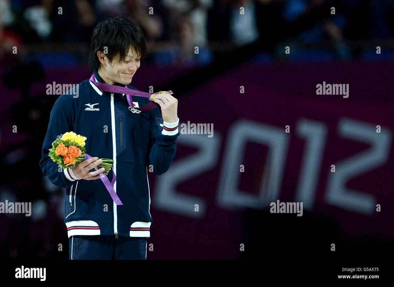 Japan's Kohei Uchimura celebrates after winning gold during the ...