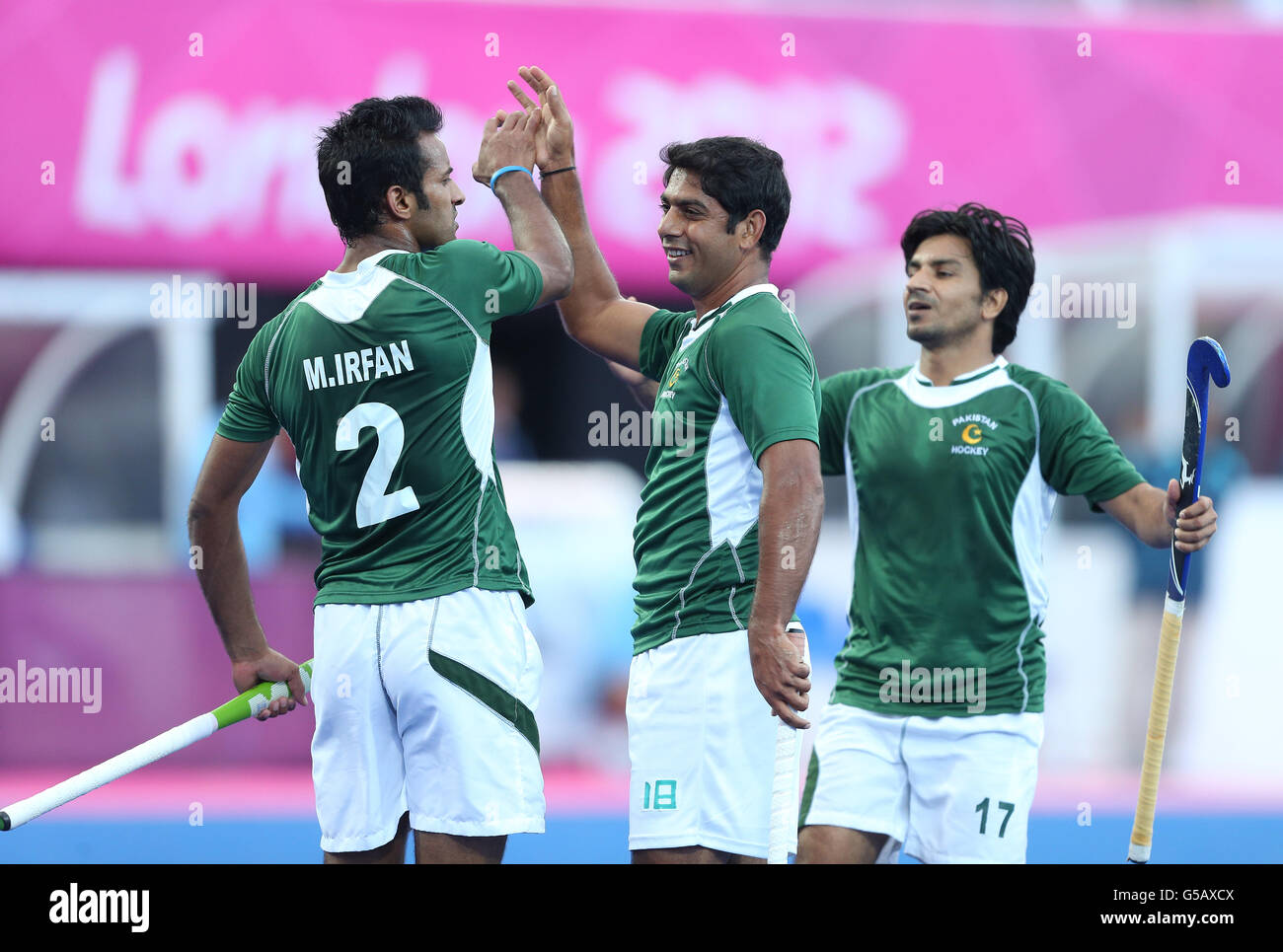 Pakistan's Muhammad Imran celebrates scoring the first goal during a ...