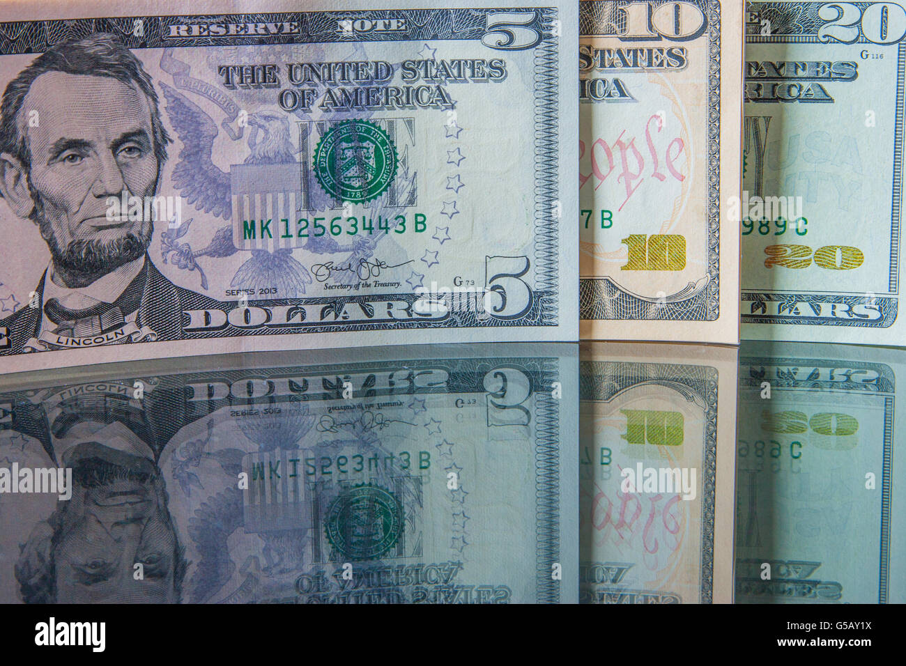 US banknotes and reflection Stock Photo - Alamy