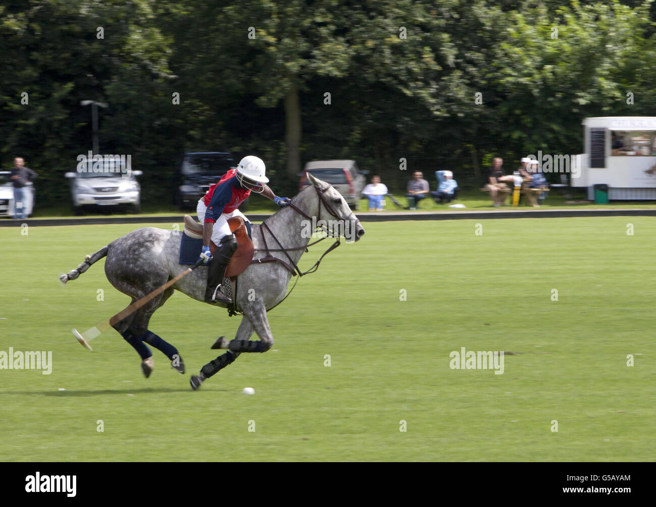 In conjunction fifth chucker polo unicef hi-res stock photography and ...