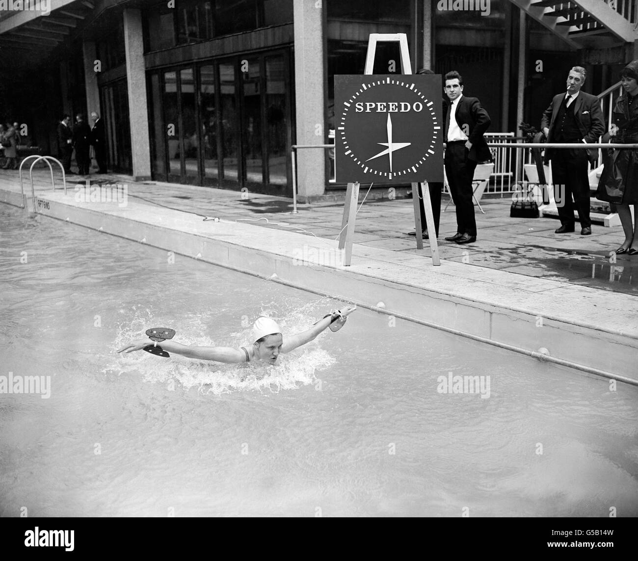 Olympic swimmer anita lonsbrough testing the arm fins known as hi-res ...