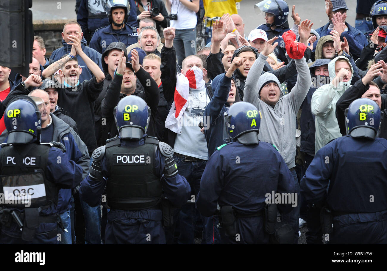 EDL supporters chant as they are confronted by anti-fascist ...