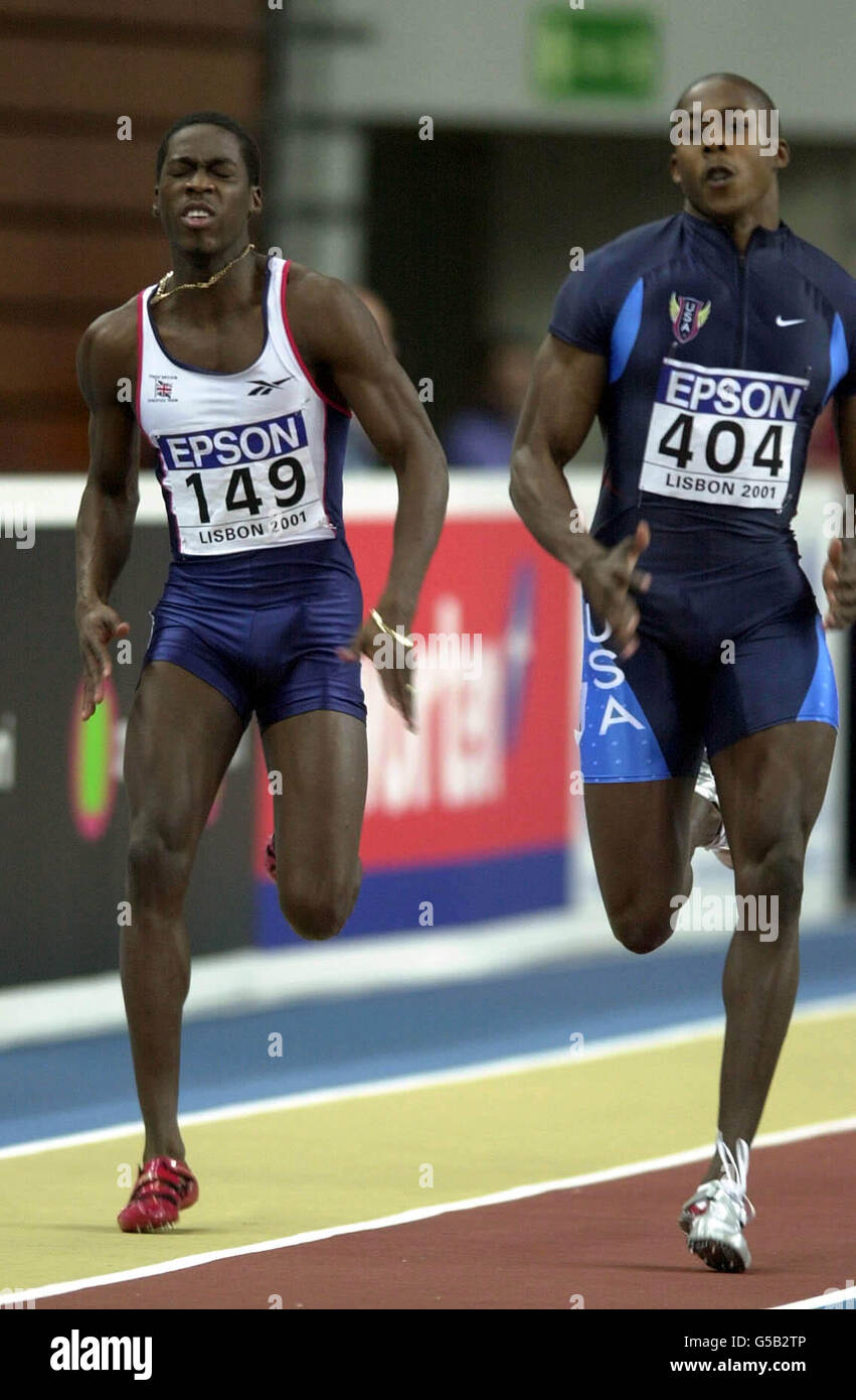 Great Britain's Christian Malcolm (left) crosses the line in second ...
