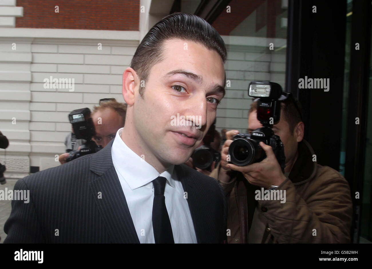 Reg Traviss court case. Reg Traviss arrives at Westminster Magistrates ...