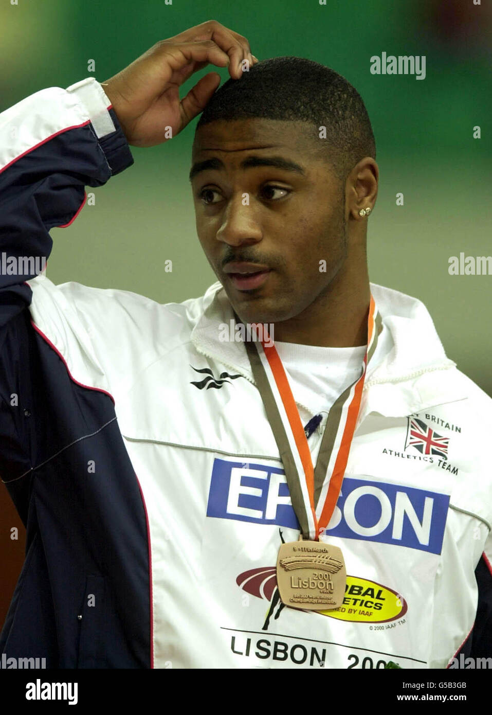 Great Britain's Mark Lewis- Francis during the medal presentatation for ...