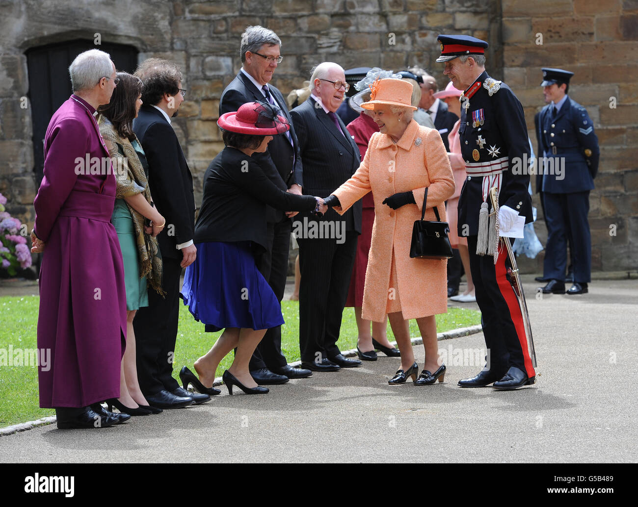 Queen Elizabeth II is introduced to local dignitaries by the Lord ...