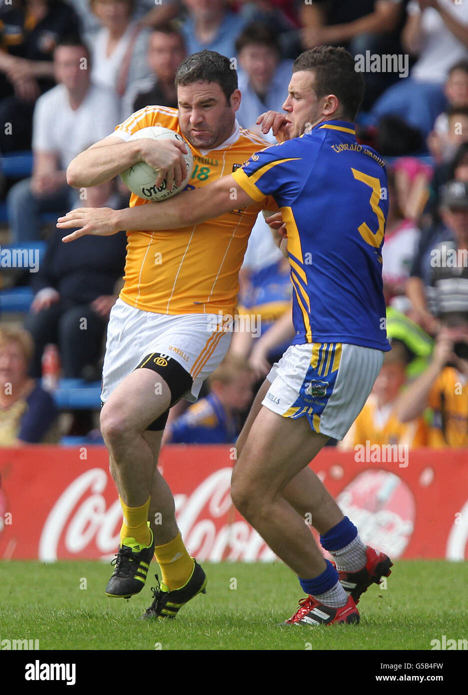 Tipperary's Paddy Codd and Antrim's Michael Magill during their GAA ...
