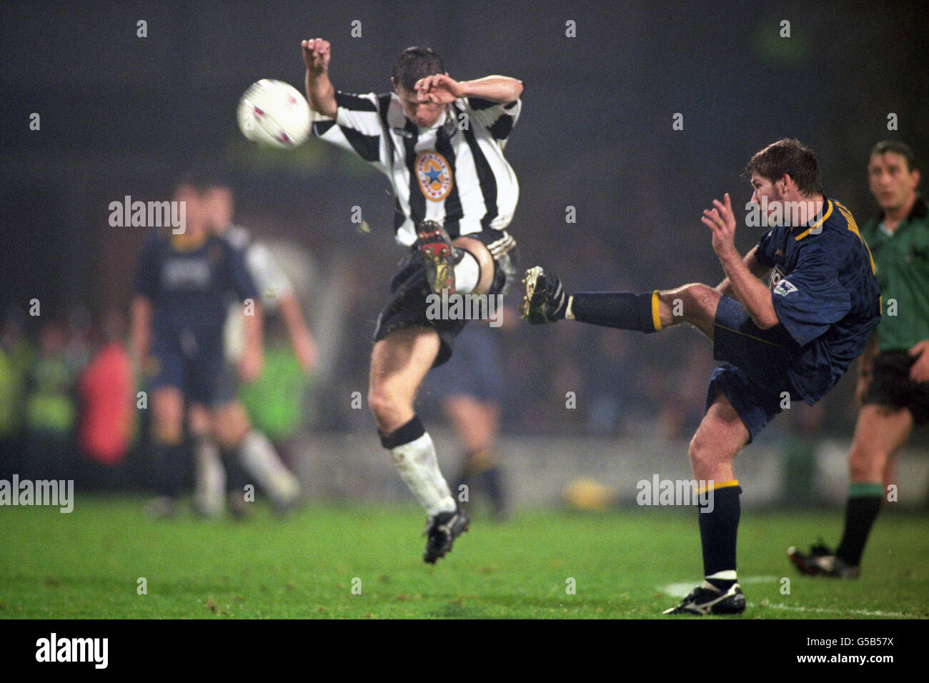 Alan Kimble, Wimbledon, clears from the flying Robert Lee Stock Photo ...