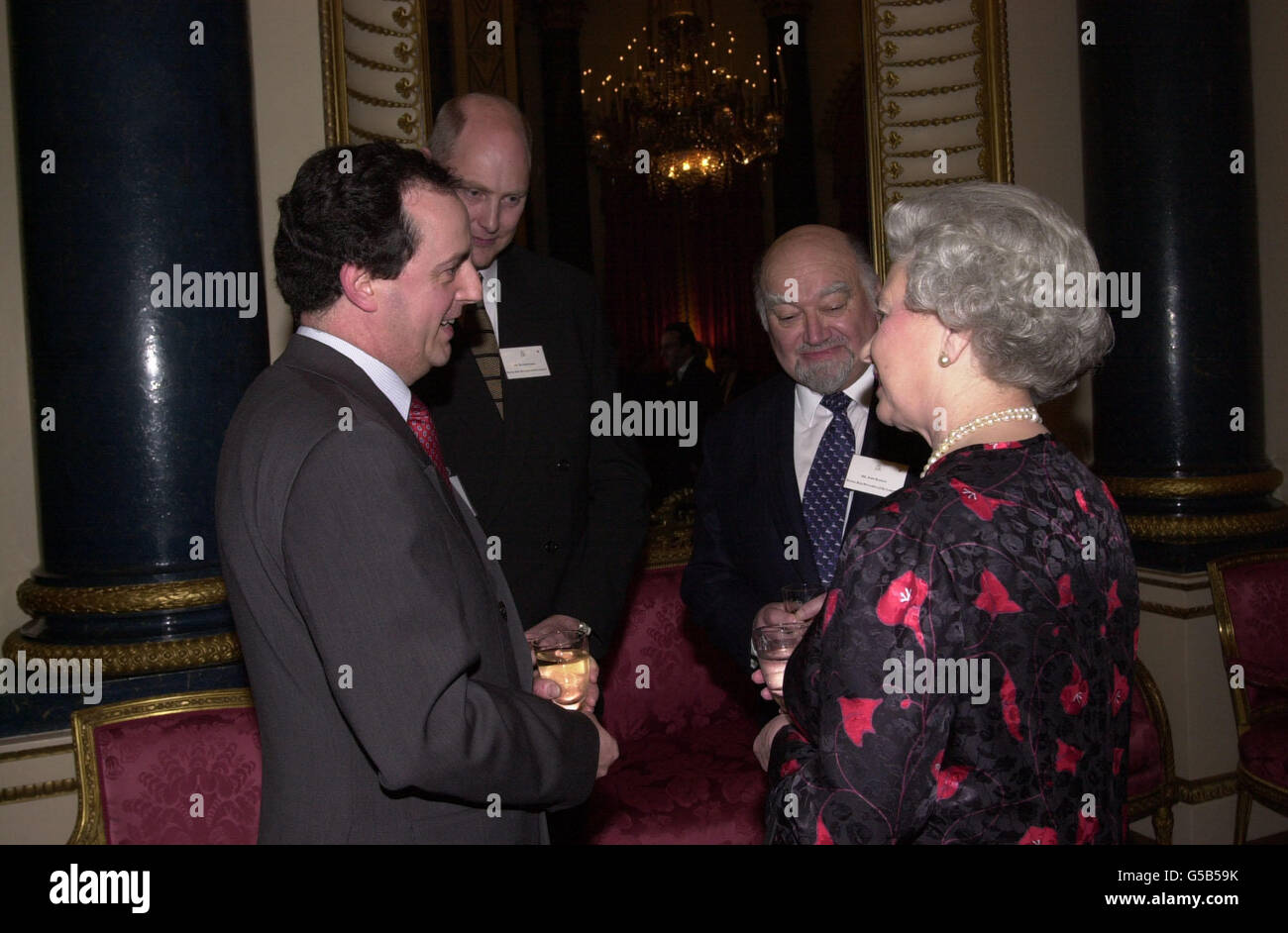 Queen Elizabeth II meets from left, Guy Griffiths, Dave Duerden and ...