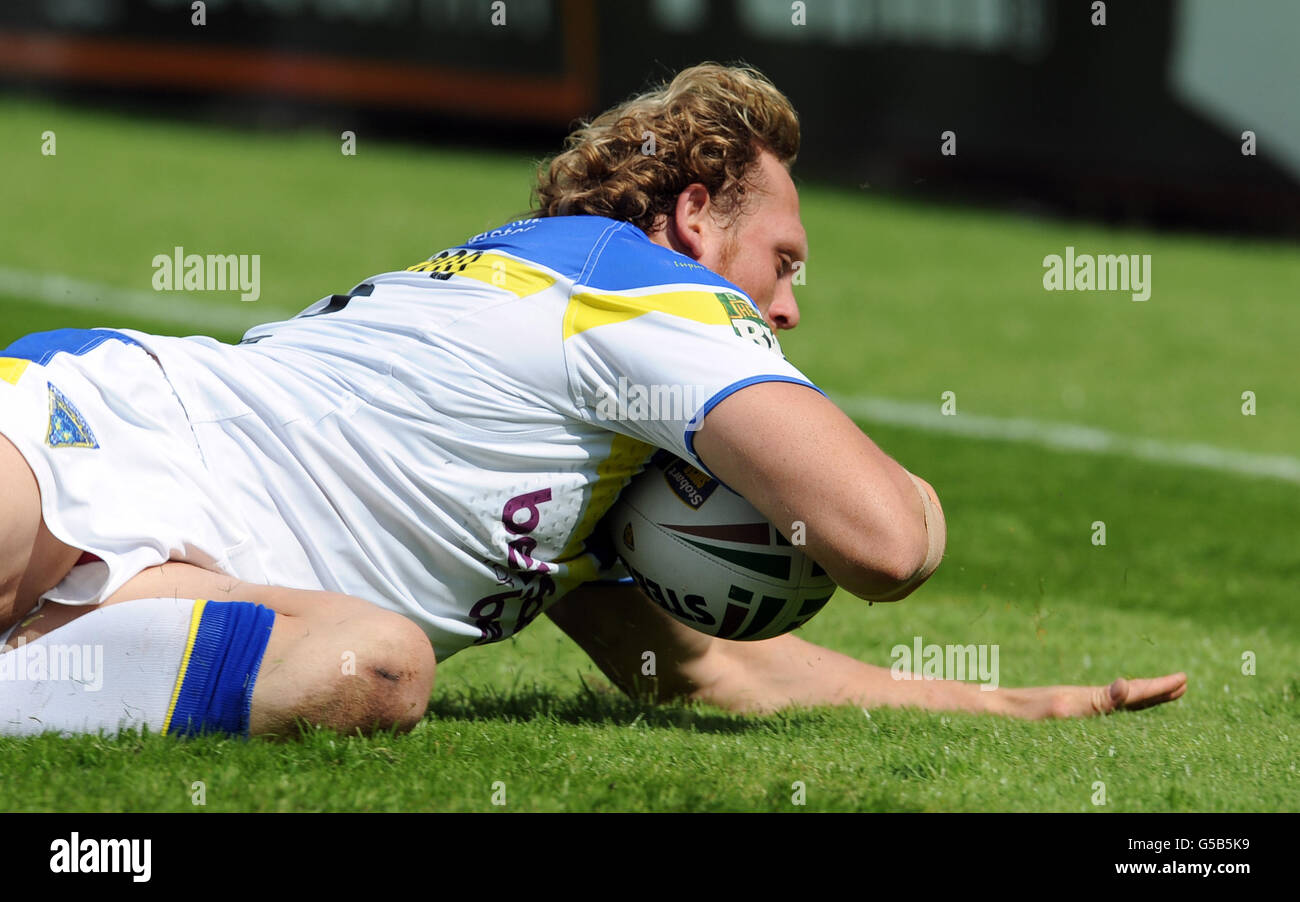 Warrington Wolves' Ben Westwood goes over to score a try during the ...
