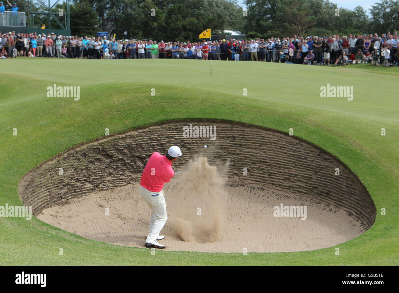 Northern Ireland's Graeme McDowell hits out of the 6th bunker during ...