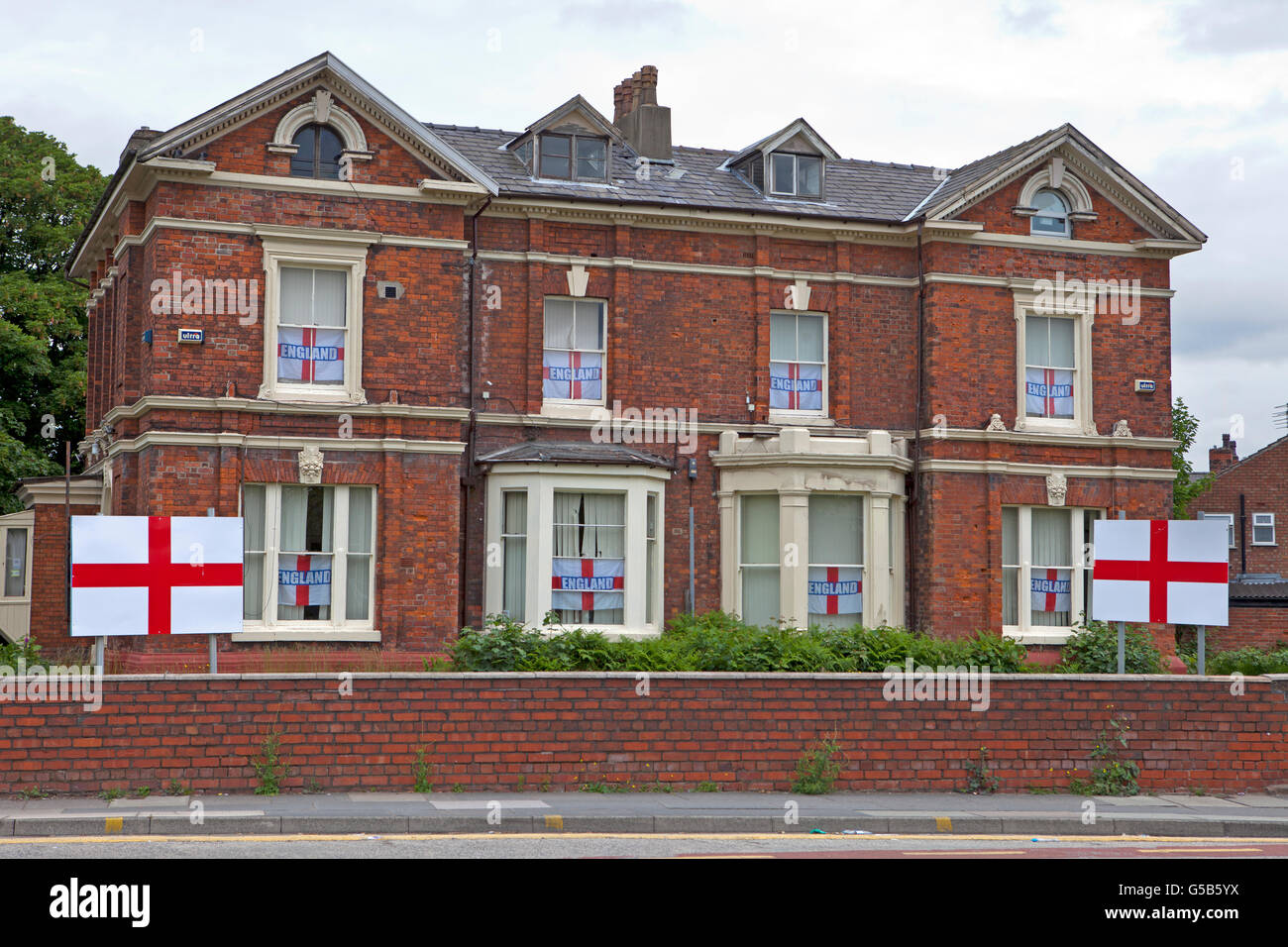British flags on a house facade hi-res stock photography and images - Alamy