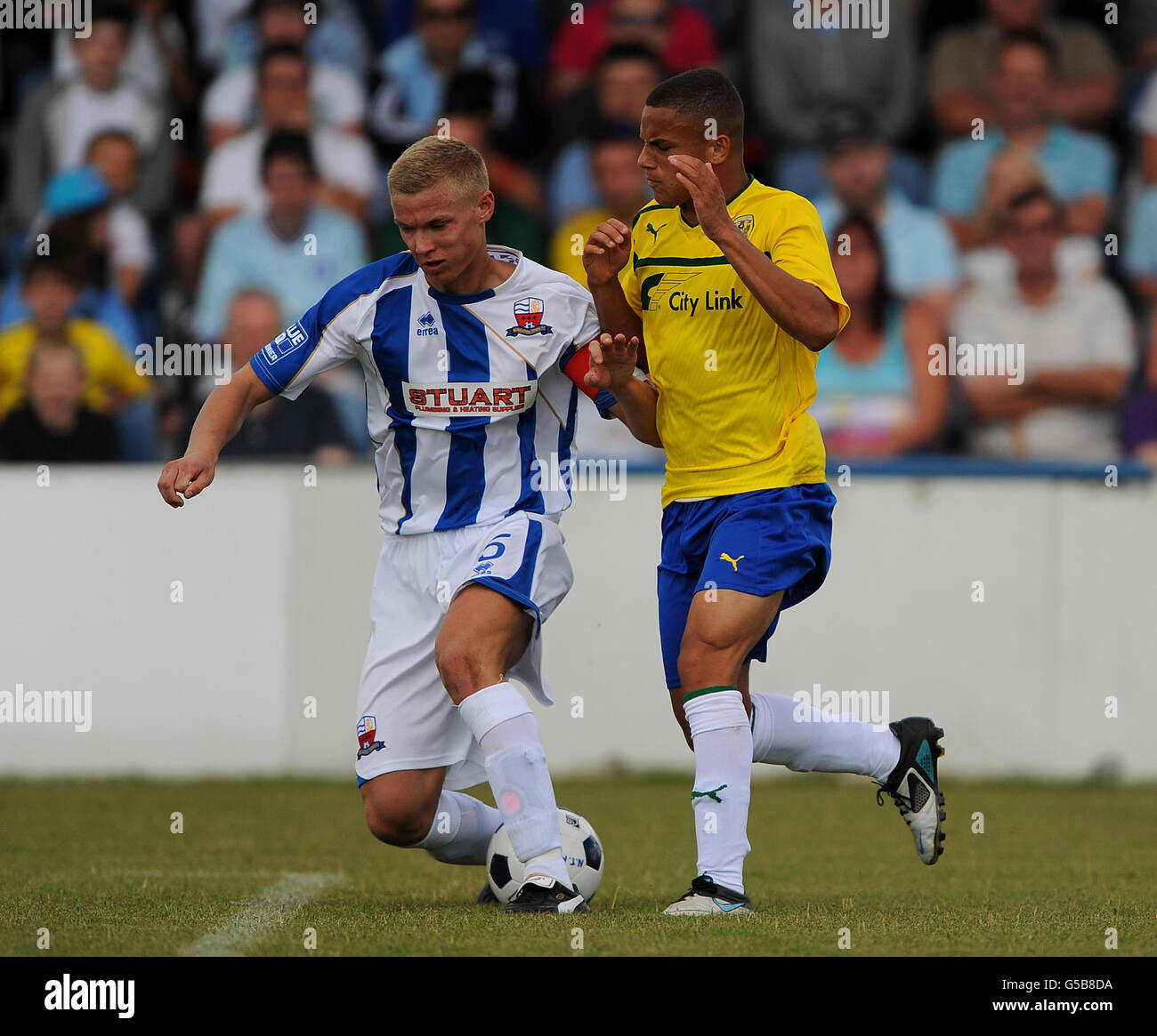 Nuneaton Town's Gaz Dean (left) and Coventry City's Louis Garner (right ...