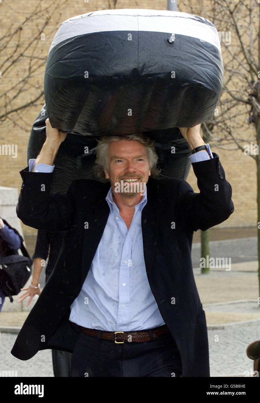 Sir Richard Branson officially launches his Virgin Mobile telephone ...