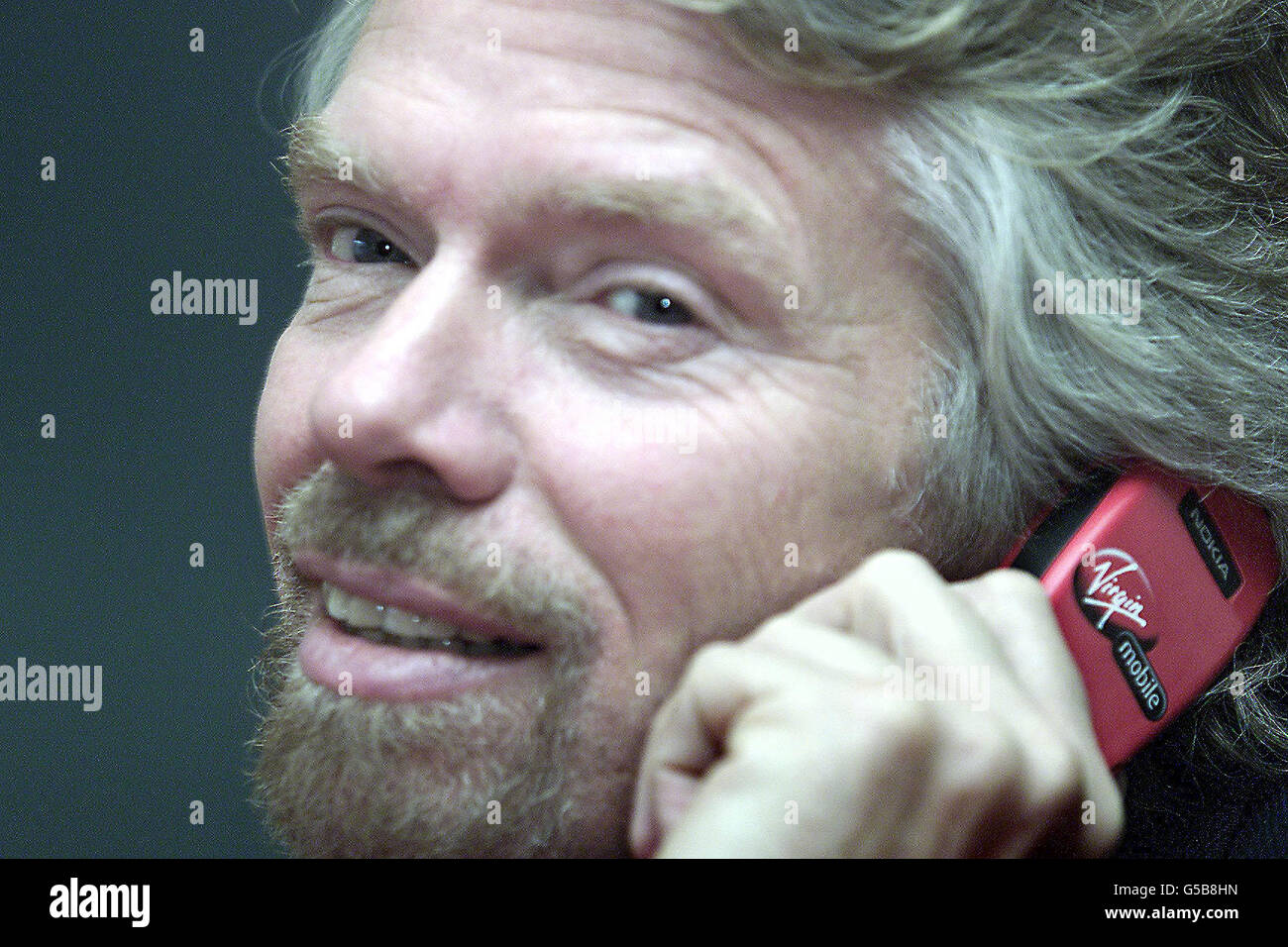 Sir Richard Branson officially launches his Virgin Mobile telephone ...
