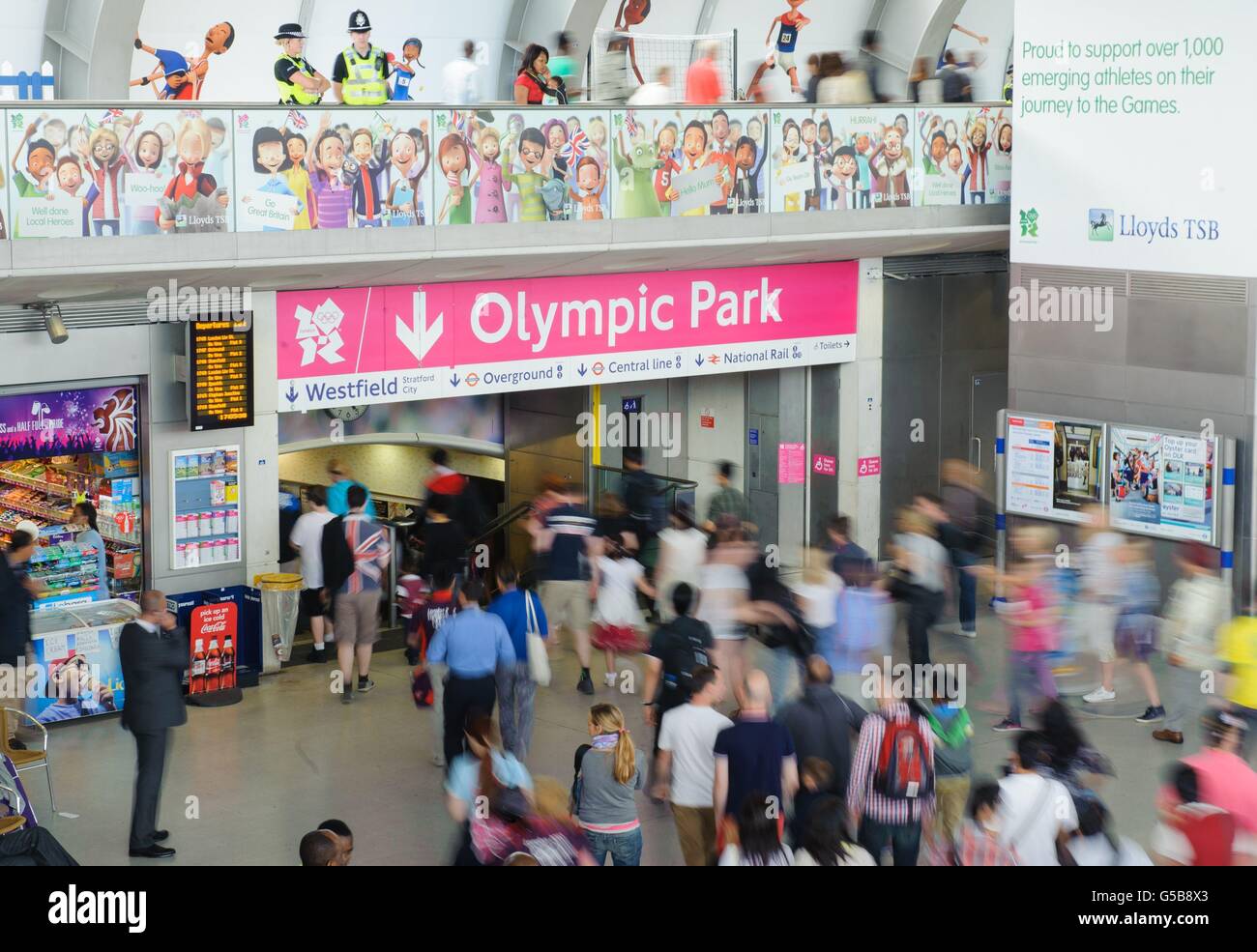 London Olympic Games - Day 1. Passengers follow signs to the Olympic ...