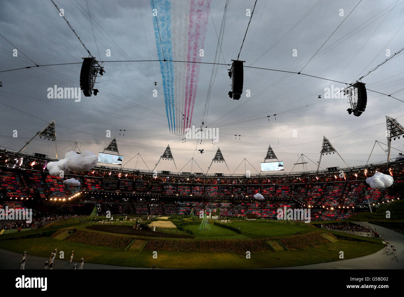 The red arrows fly over opening ceremony olympic stadium hi-res stock ...