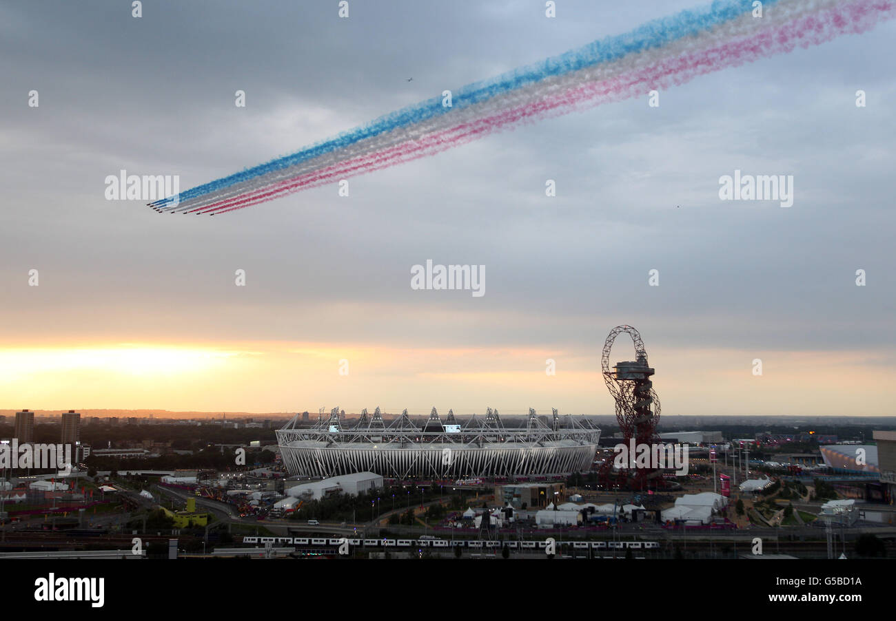 The Red Arrows perform a flypast over the Olympic Park in London ahead ...