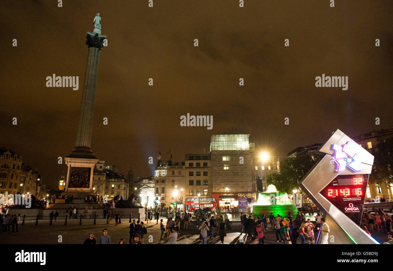A general view of Trafalgar Square, London showing the clock counting ...