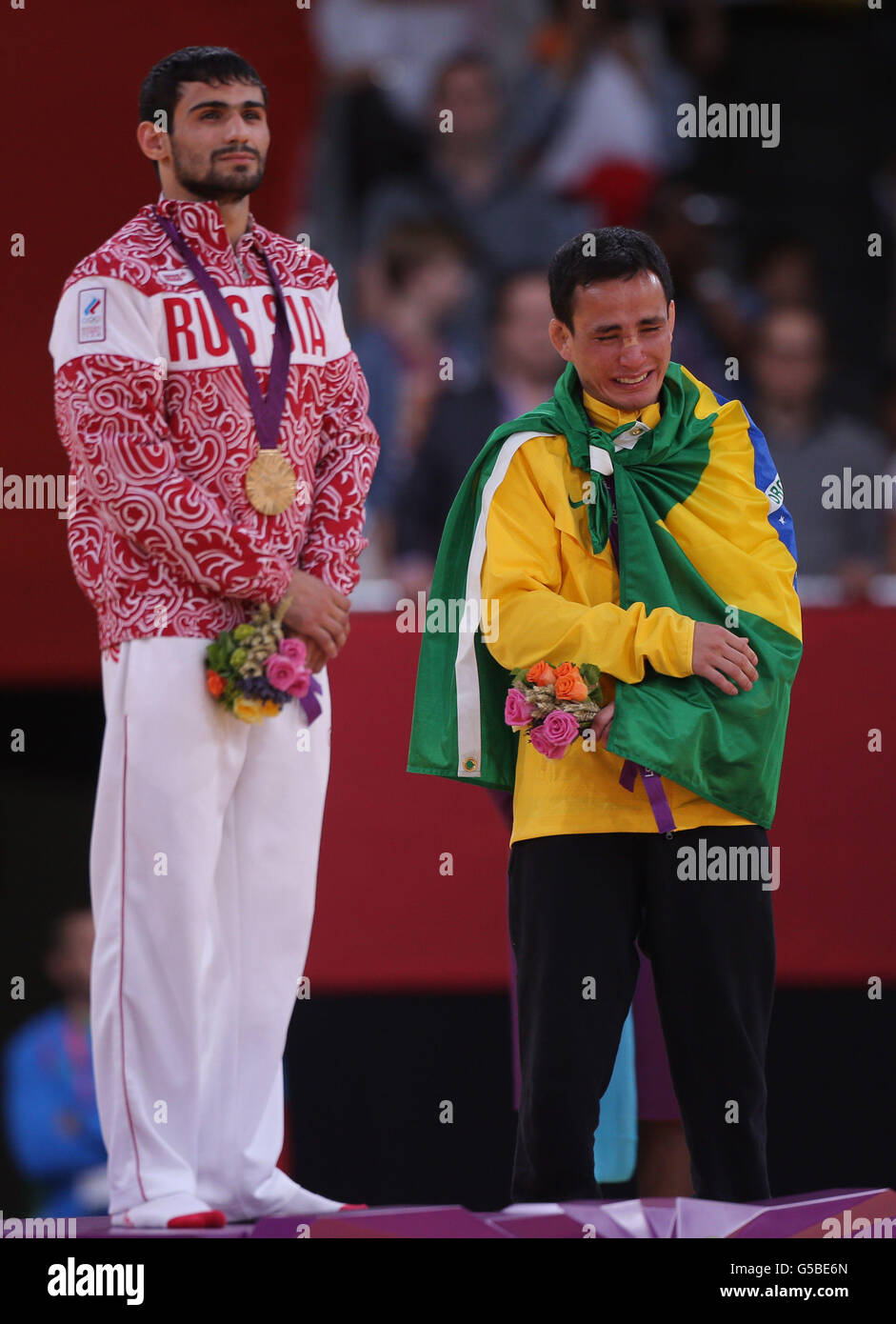 Brazil's Felipe Kitadai crys as he celebrates his Bronze medal standing ...