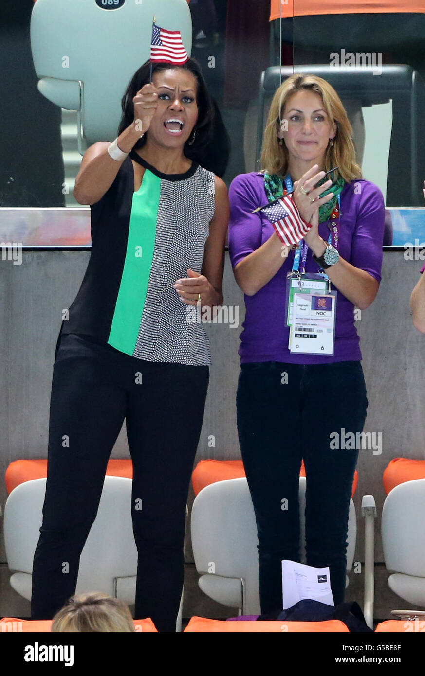 USA First lady Michelle Obama watches the swimming in the Aquatics ...